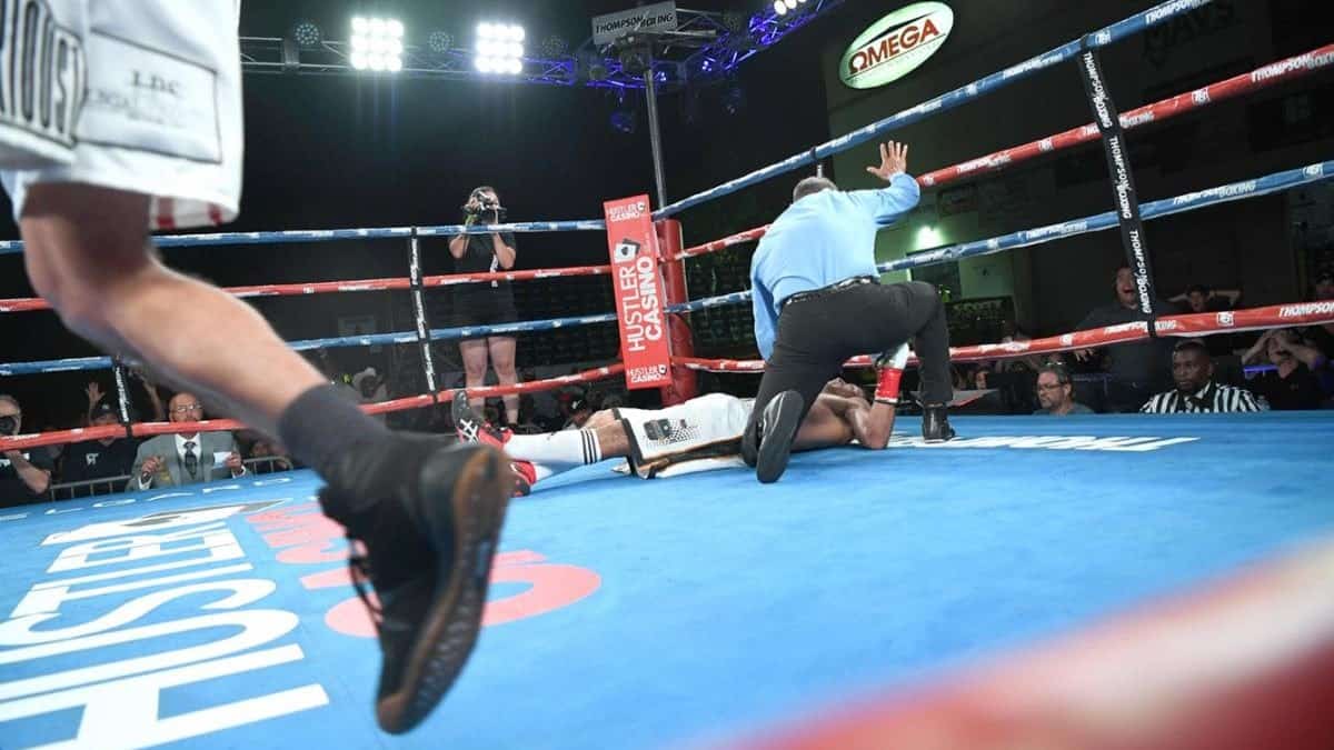 Boxer tells foe, "protect yourself at all times" after touch-gloves KO